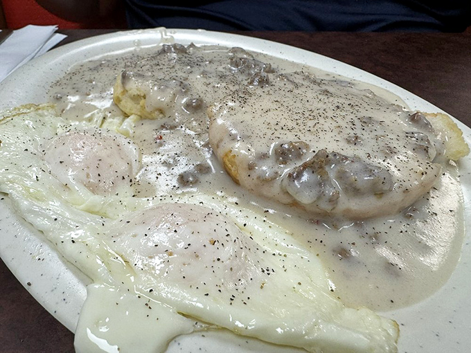 Biscuits and gravy: the breakfast that says, "Go back to bed after this." A peppery blanket of sausage gravy that would make your grandmother nod in approval.