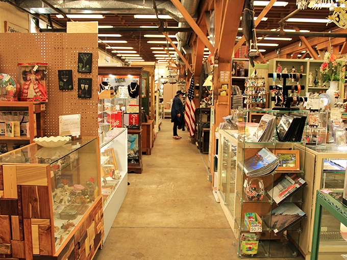 Narrow aisles become highways of discovery where strangers exchange knowing glances that say, "Yes, I too am helplessly addicted to hunting vintage treasures."