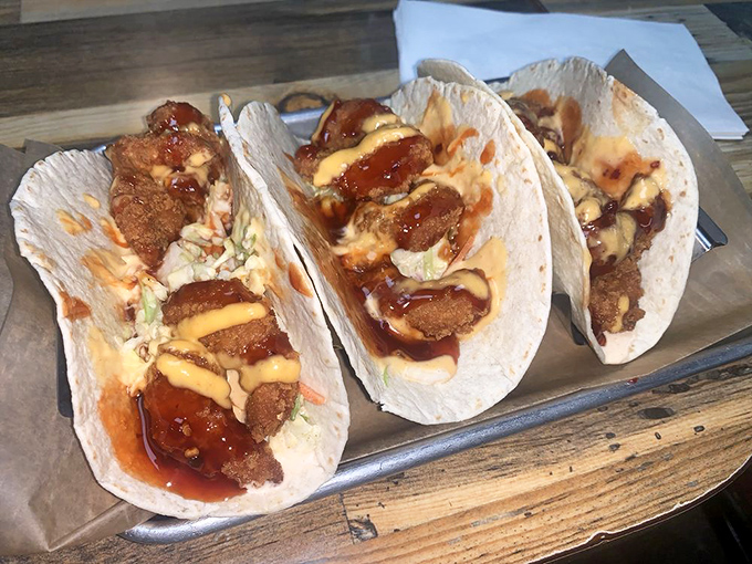 These tacos aren't just filled with shrimp&mdash;they're filled with possibility. The sauce drizzle is like the perfect punchline to a delicious joke. 