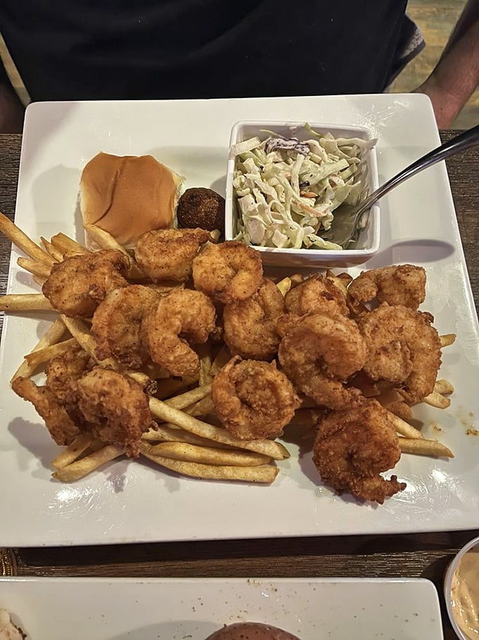 Plump shrimp wearing golden jackets of perfectly seasoned breading. Like tiny treasures from the sea that sacrificed themselves for your happiness.