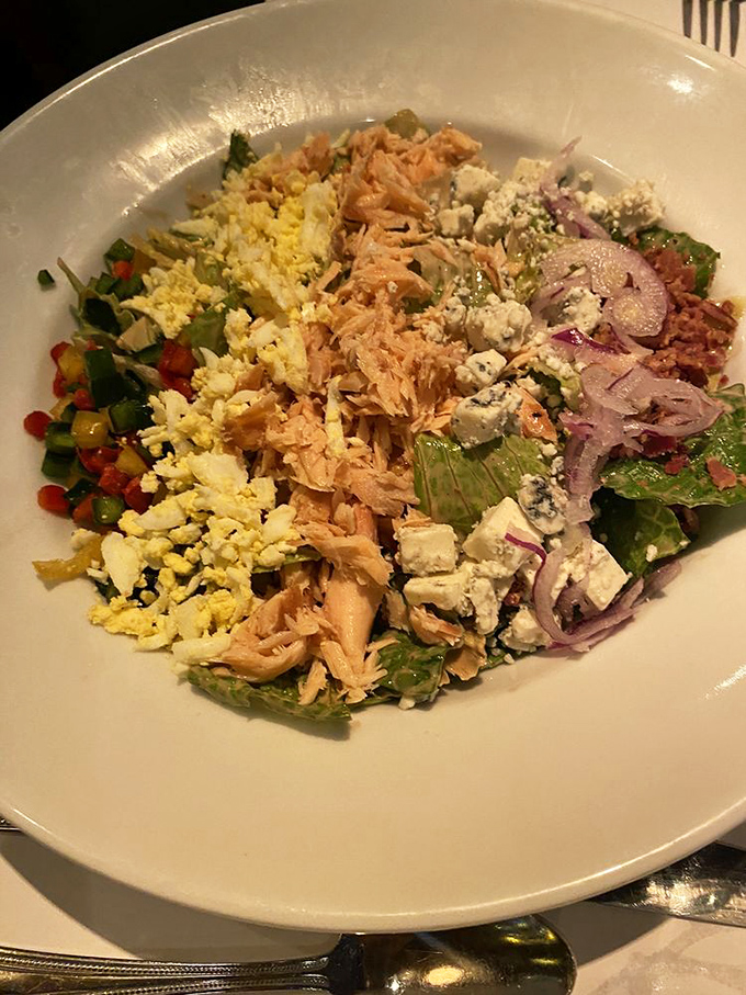 A salad that makes you forget you're eating healthy &ndash; salmon, eggs, and blue cheese arranged like edible modern art.