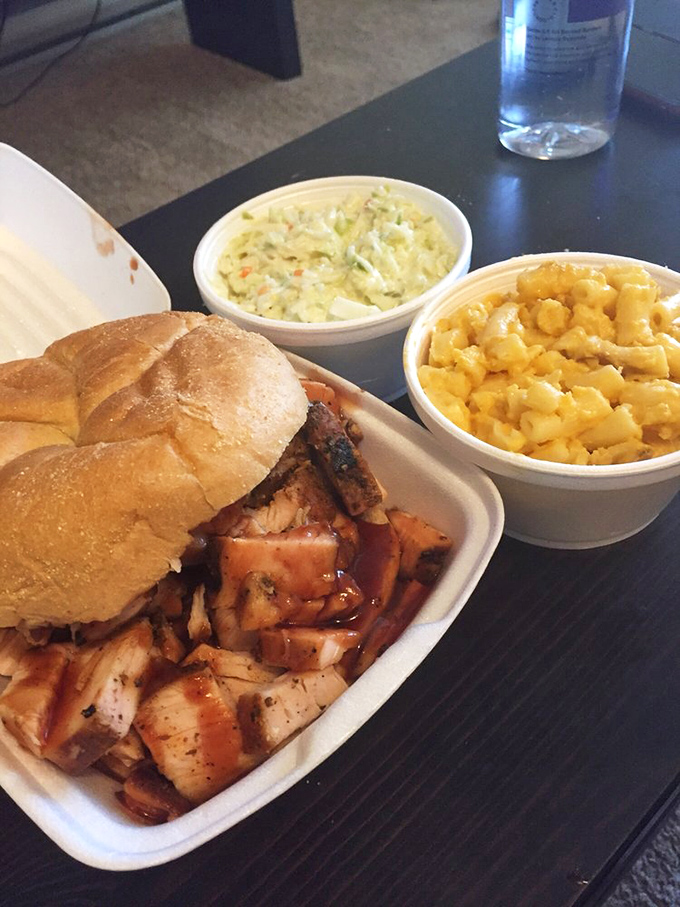 Chicken that didn't die in vain. Smoky, saucy perfection nestled between bread, with sides that know their supporting role and play it beautifully.