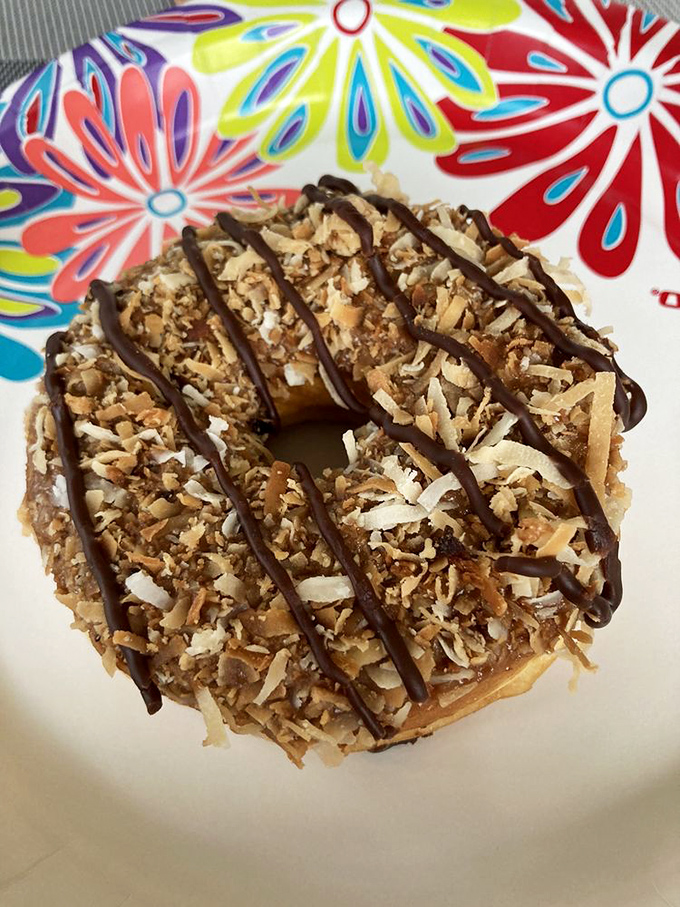 Coconut, caramel, and chocolate stripes unite in perfect harmony. Like a tropical vacation in donut form.