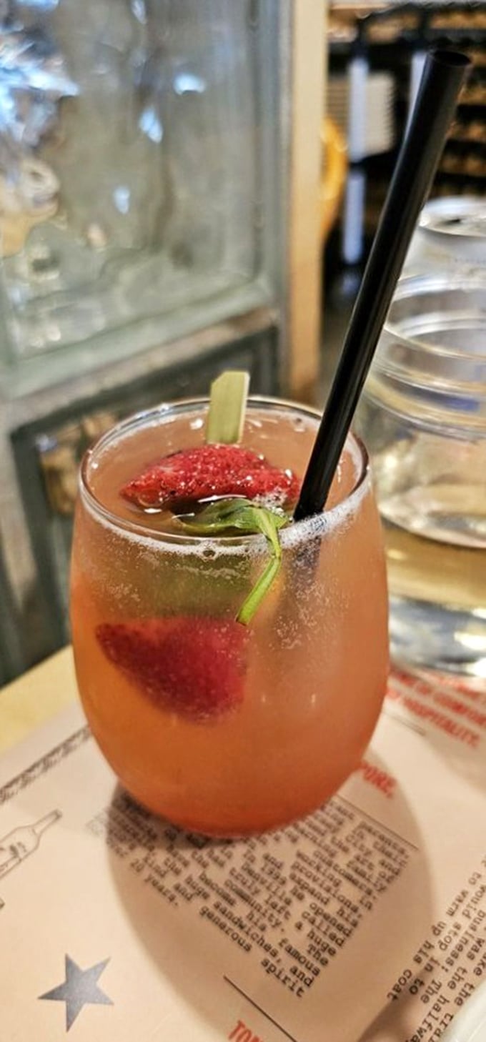 This isn't just a cocktail&mdash;it's summer in a glass. The strawberry basil lemonade spritz offers the perfect acidic counterpoint to rich pasta dishes.