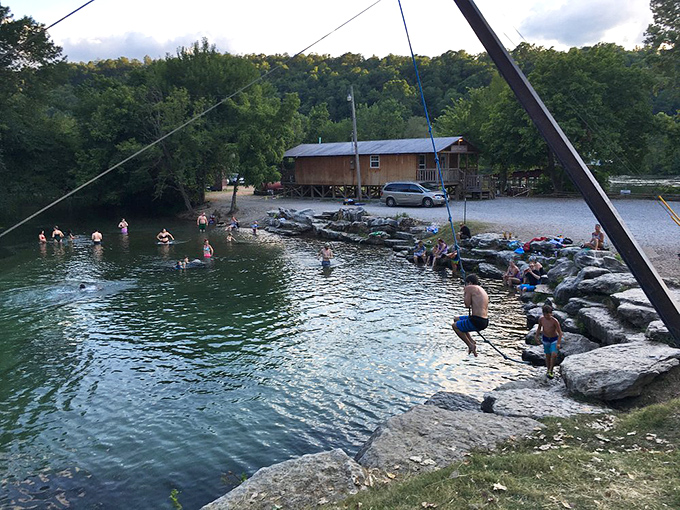 Summer's perfect equation: clear water + rocky shore + fishing pole = Arkansas paradise. No wonder they call Cotter the "Trout Capital USA."