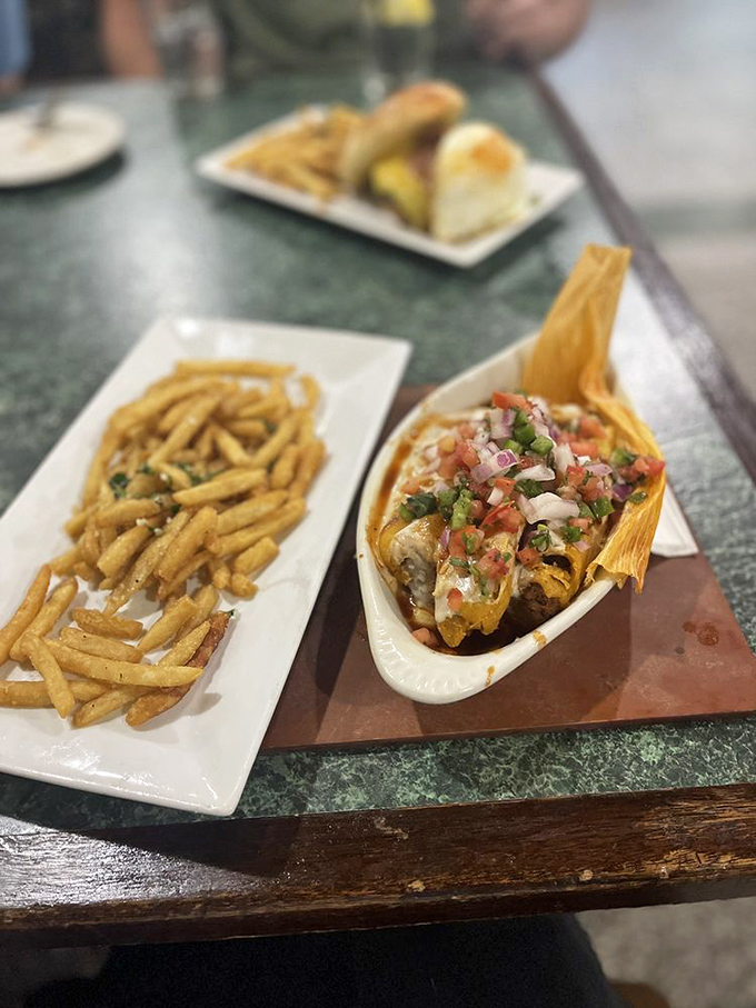 When British pub tradition shakes hands with southwestern flair&mdash;crispy fries alongside flavor-packed tamales prove this kitchen knows no borders.