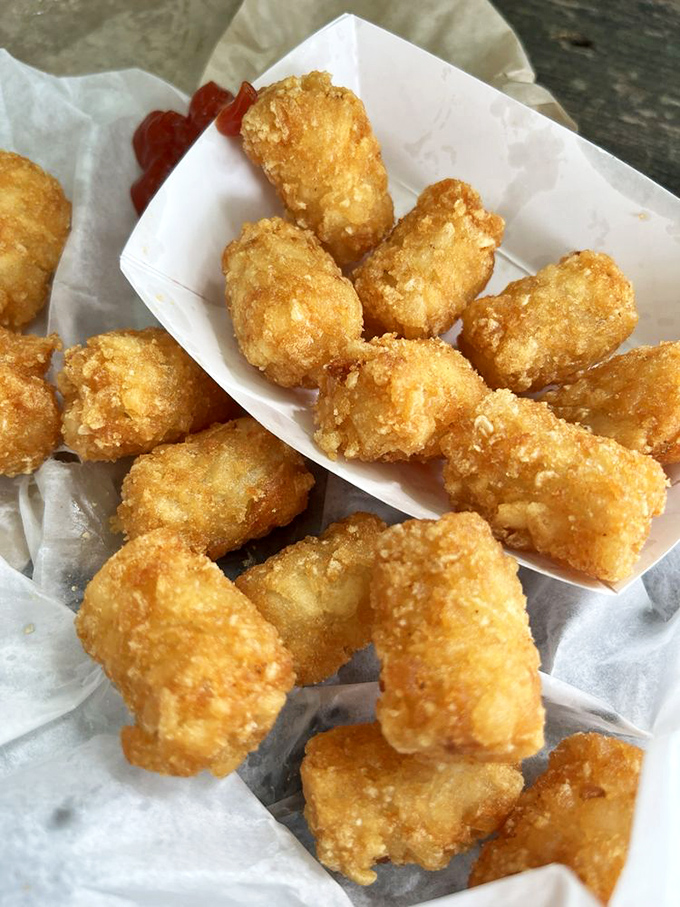 Golden-brown nuggets of potato paradise that make you question why anyone would ever eat a regular french fry again.
