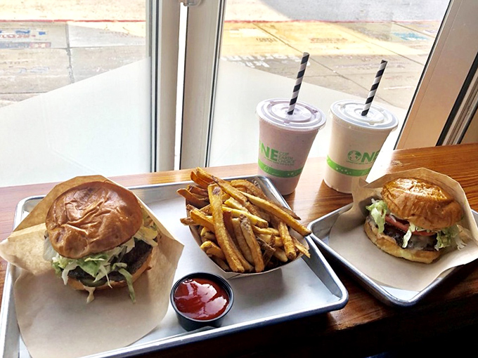 A burger so photogenic it probably has its own Instagram account. That perfect cross-section reveals layers of flavor waiting to be discovered.