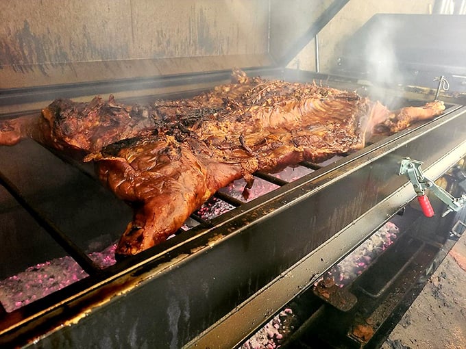 The pit is where magic happens&mdash;whole hogs transforming over smoldering wood into something transcendent. Smoke signals from barbecue heaven.