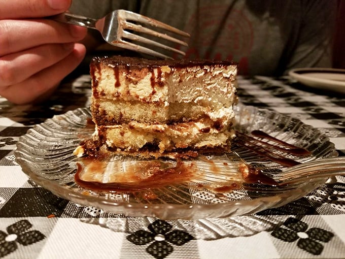 Tiramisu layers that tell a story of coffee, cream, and cocoa coming together like the world's most delicious peace treaty.