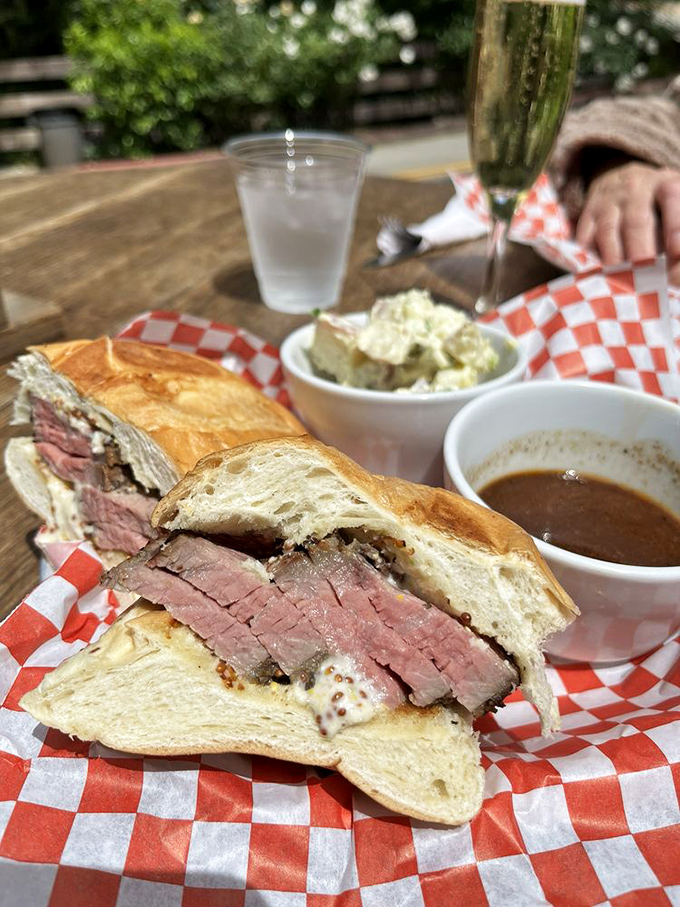 The French Dip version comes with its own swimming pool of savory jus&mdash;a sandwich that demands to be dunked like an Olympic diver.