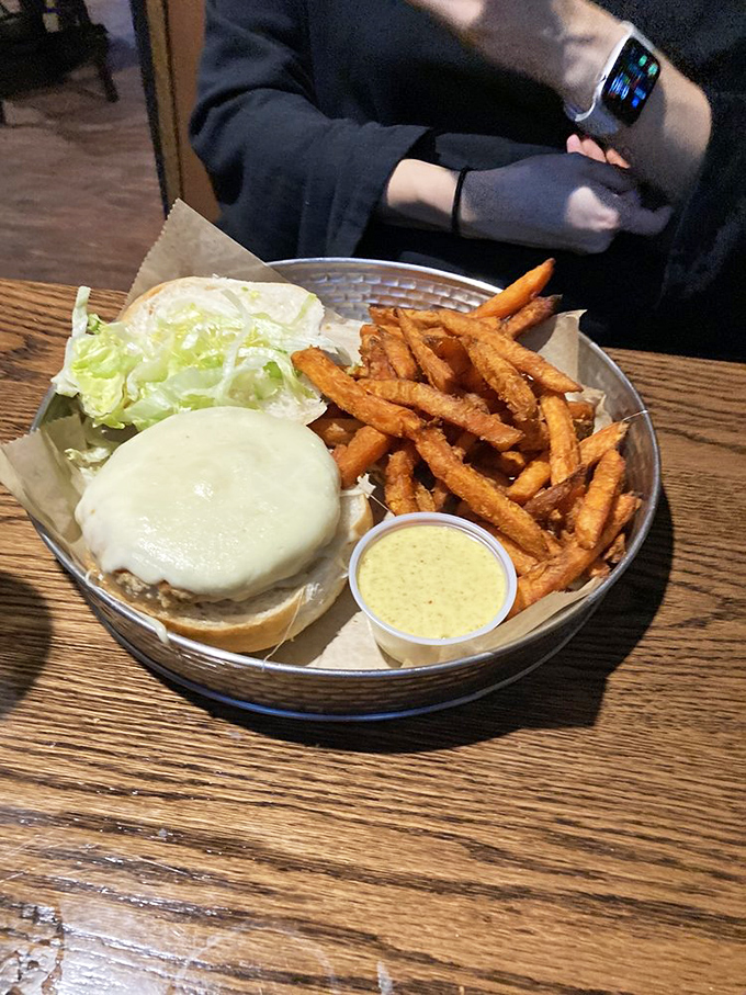 This isn't just a burger&mdash;it's a masterclass in balance. Melty cheese, fresh lettuce, and a bun that's somehow both substantial and cloud-like.