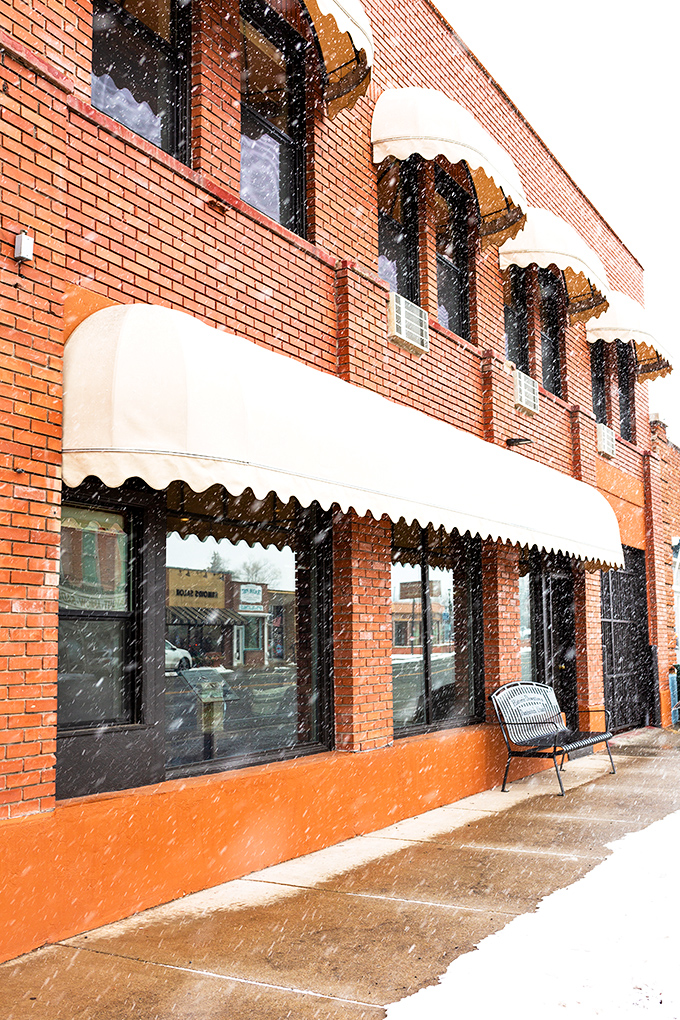 Snow falls gently on Panguitch's historic buildings, transforming Main Street into a winter wonderland that feels like stepping into a Norman Rockwell painting.