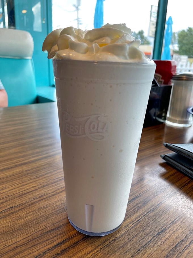That's not just a milkshake&mdash;it's a frothy tower of vanilla nostalgia so thick your straw stands at attention, saluting decisions well made. 