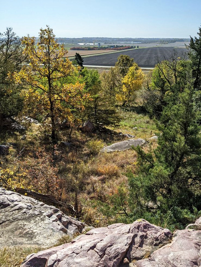 Fall colors frame a vista that stretches to forever. From this vantage point, you can almost see your house from here. Almost.
