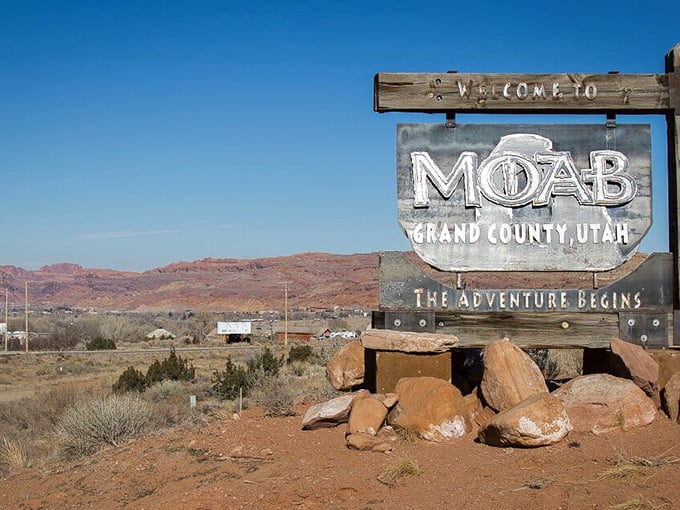 "The adventure begins" isn't just marketing—it's a promise. Moab's welcome sign sits like a sentinel guarding the gateway to wonderland.