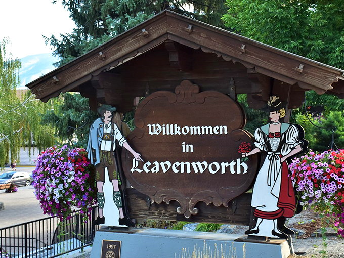 "Willkommen in Leavenworth" says the sign, while the flowers quietly add, "Seriously, take a photo here or your trip didn't happen."