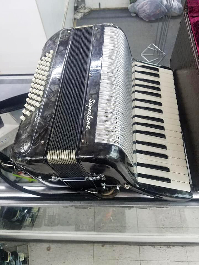 That Weltmeister accordion has probably played more polkas than you've had hot dinners. Just imagine the wedding receptions it's seen!