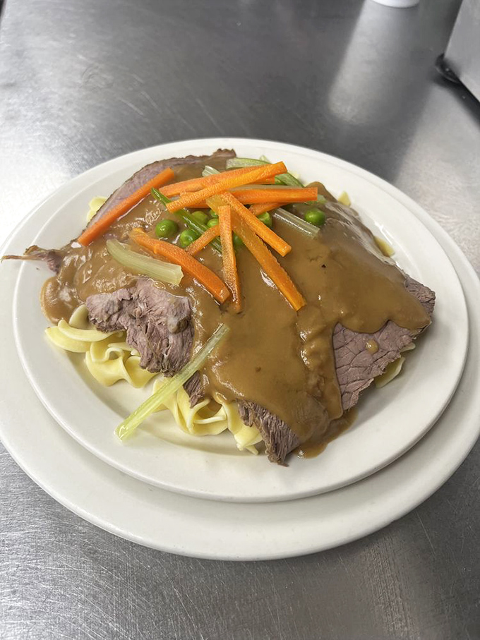Pot roast that doesn't just fall apart&mdash;it surrenders completely, waving the white flag of tenderness over a bed of buttery noodles. 