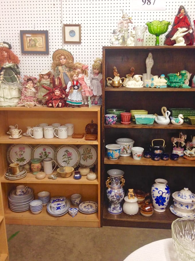 Porcelain dolls watch with painted eyes while delicate china waits for new tea parties. Your grandmother would approve of this collection.