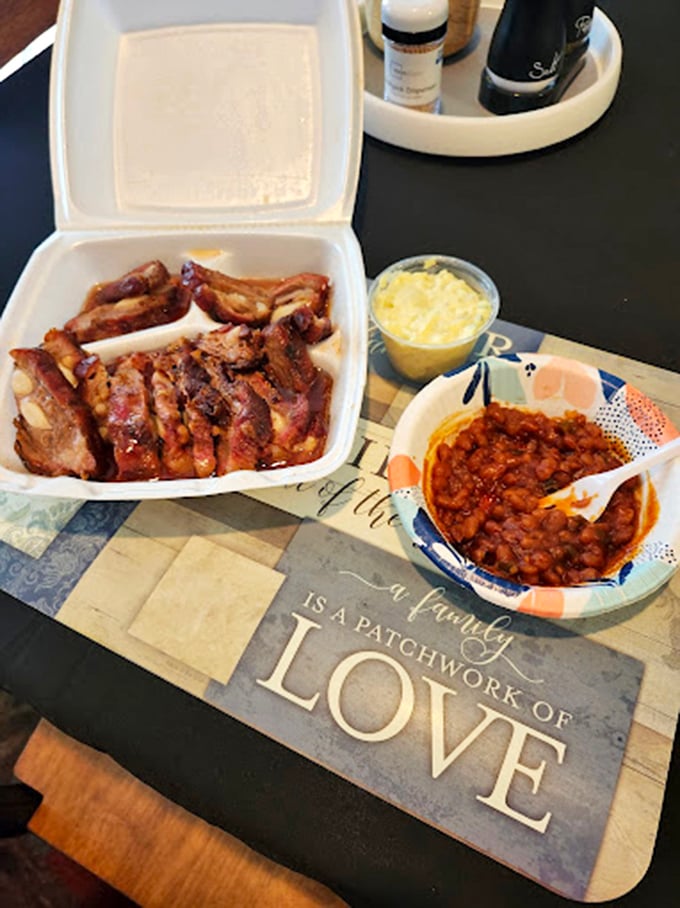 That placemat says "family" and "love," but the ribs with those sides are speaking the same language without saying a word.