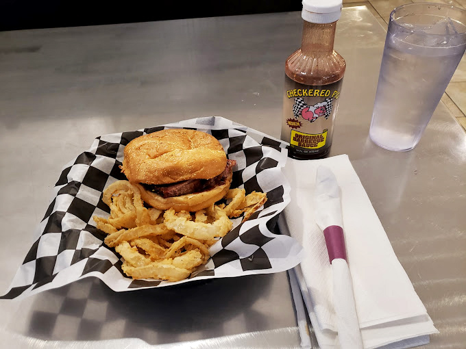 The sandwich that makes you wonder why hands were invented if not for this very purpose. Those onion rings are the supporting actors who steal the scene.