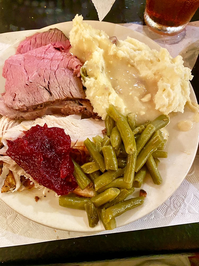 Southern cooking on a plate: ham, lima beans, green beans, and potatoes with gravy. The kind of meal that makes you want to adopt a drawl.