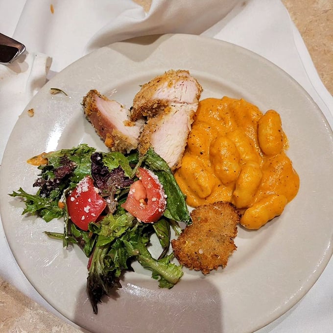 Strategic plate architecture at its finest: protein, pasta, and a token vegetable to maintain the illusion of balance.