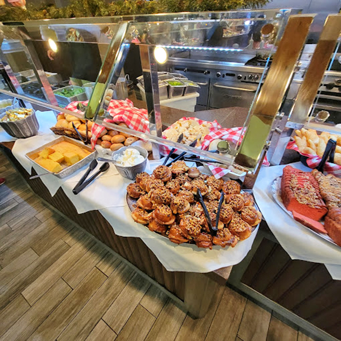 Buffet artistry at its finest—cinnamon rolls positioned strategically next to savory options. The classic "one for the table" that somehow becomes "one for me."