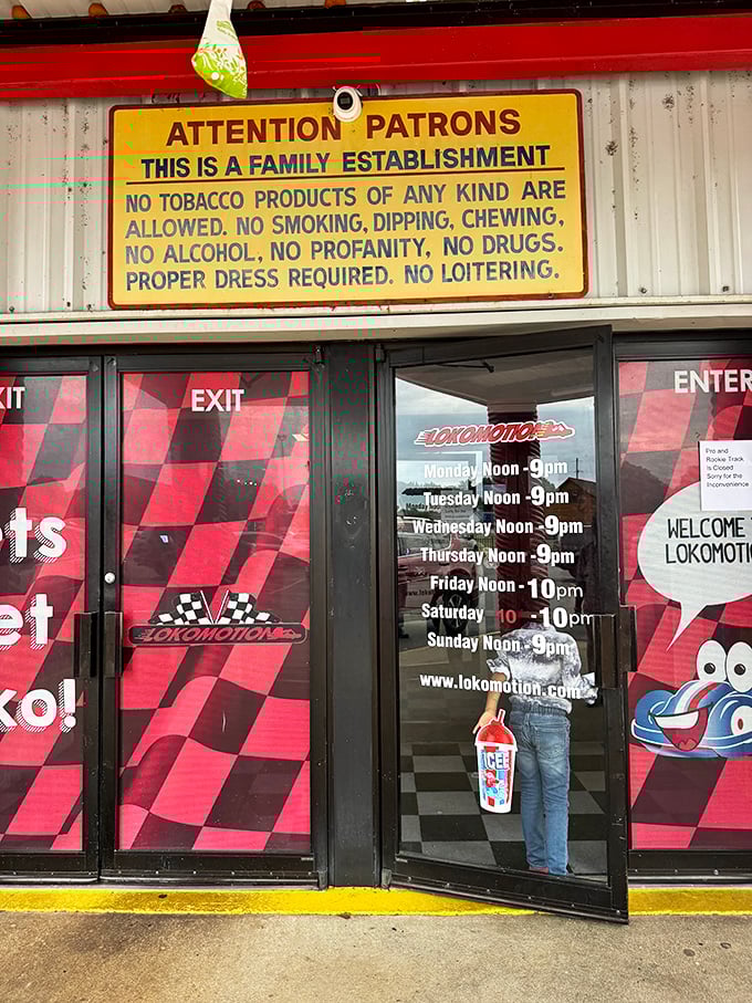 Business hours that accommodate both early birds and night owls. The checkered flag pattern isn't subtle—they know exactly what you came for.