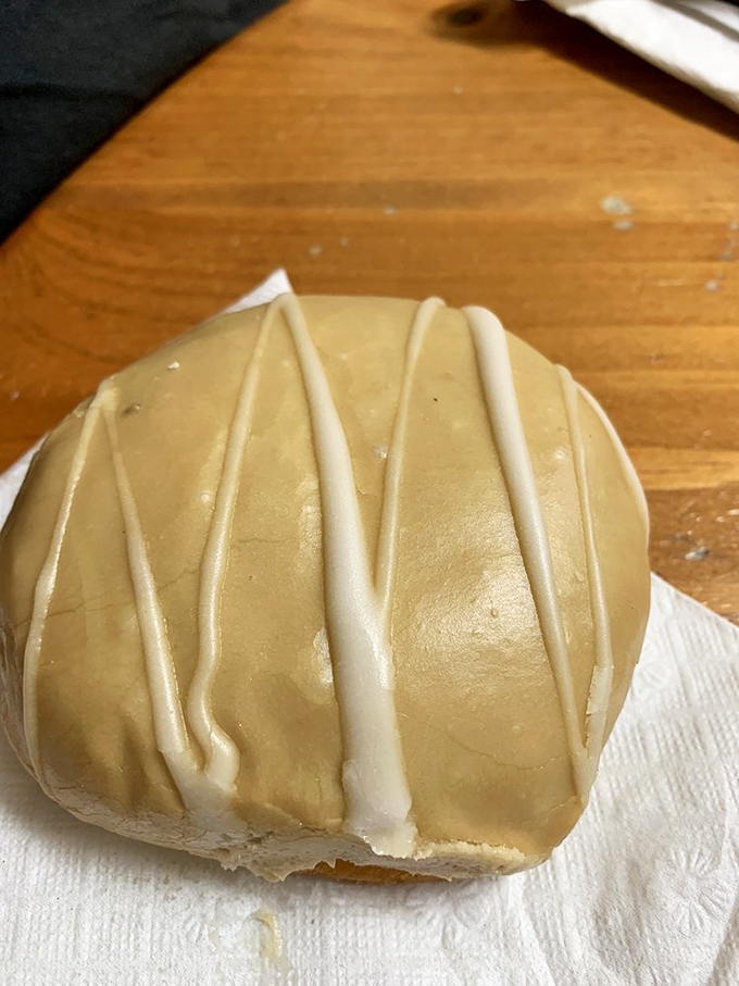 Caramel glaze with artistic white drizzle&mdash;proof that sometimes the most beautiful things in life are also the most delicious.