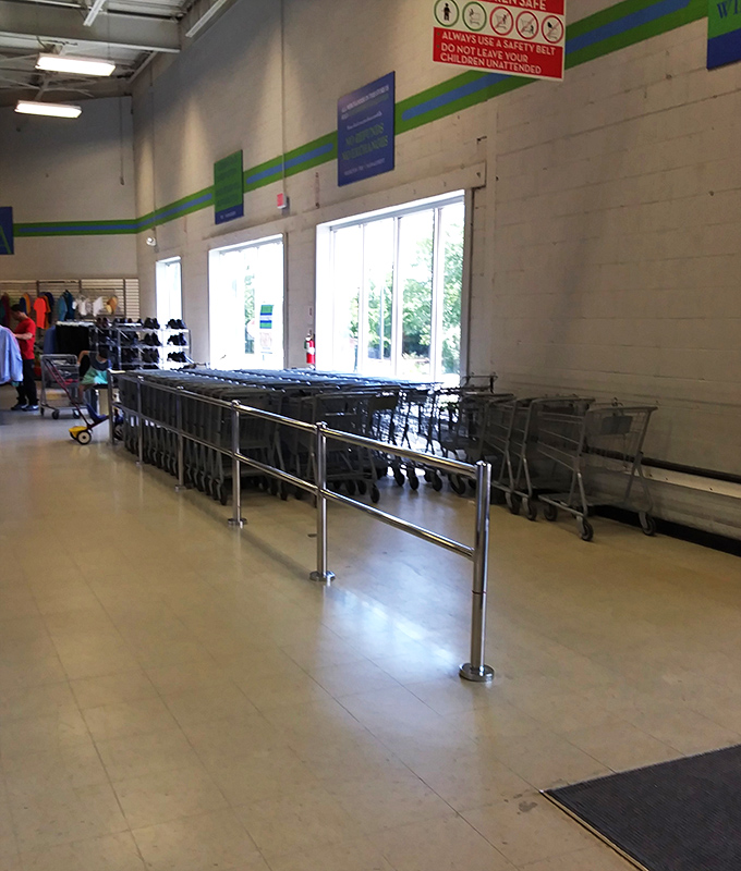 The universal starting line. These carts stand ready for thrifting marathons where the only competition is finding that perfect something before someone else does.