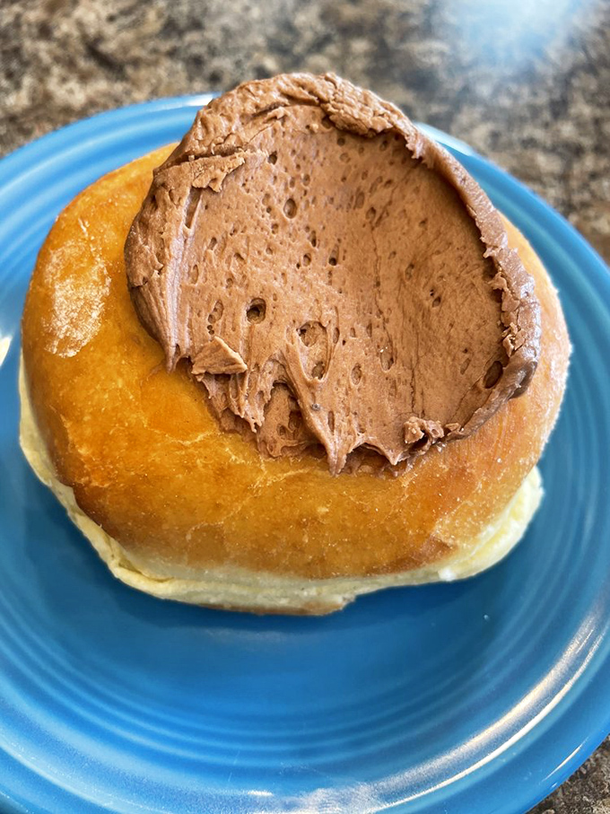 This isn't just a donut&mdash;it's dessert masquerading as breakfast. The rich chocolate topping makes morning meetings suddenly bearable.