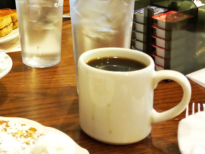 Even the coffee comes with a side of nostalgia, served in sturdy mugs that feel like they've been warming hands since before smartphones ruined dinner conversation.