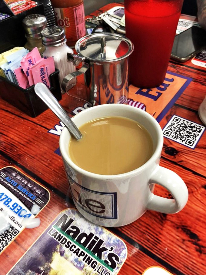 The humble coffee mug&mdash;steaming with that perfect diner brew that somehow tastes better than any artisanal pour-over. The elixir of morning conversation.