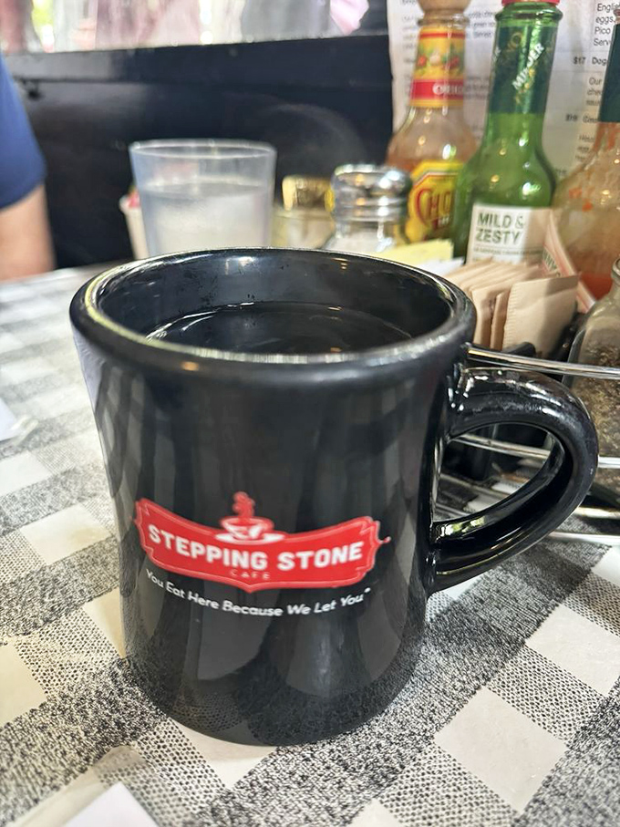 The unofficial mascot of breakfast: a sturdy mug emblazoned with their cheeky motto, "You Eat Here Because We Let You." Coffee never had a better home.