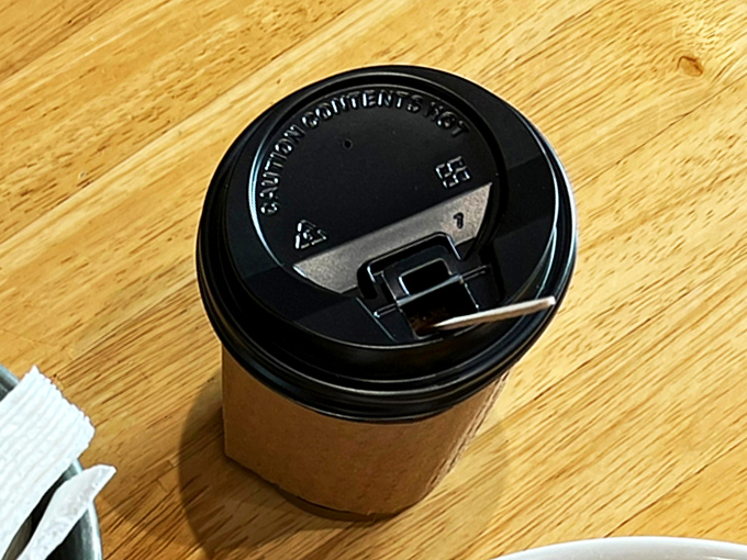 Even their coffee cups seem to say, "Take a moment, friend. The emails will wait, but this perfect brew won't."
