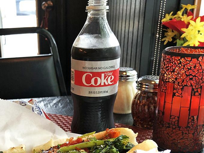 Even a simple Diet Coke becomes part of the experience, standing by as a faithful companion to the Italian feast unfolding before you.