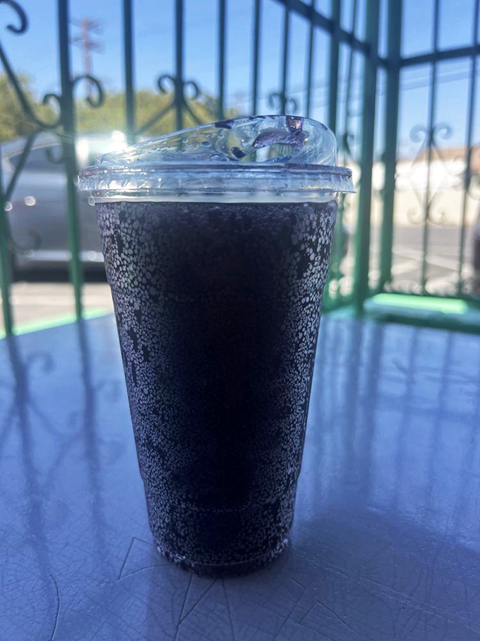 That ice-cold Coca-Cola isn't just a beverage&mdash;it's the perfect companion to cut through the richness of a chili cheese dog. Simple pleasures, profound satisfaction.