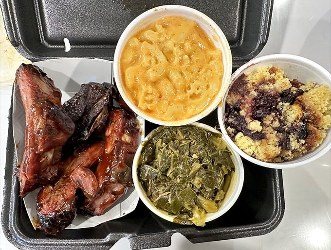 The holy trinity of barbecue sides: mac and cheese, collard greens, and ribs. A balanced diet if I've ever seen one.