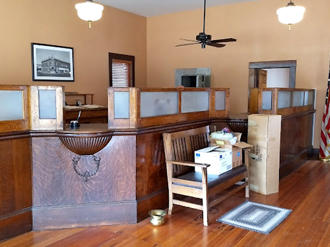 This vintage bank counter serves as the museum's welcome area. Deposit your preconceptions, withdraw a new appreciation for agricultural innovation.