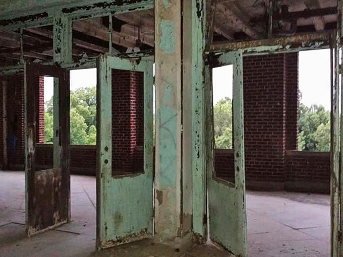 The infamous "Death Tunnel" descends into darkness, a 500-foot final journey for thousands of tuberculosis victims seeking one last exit. 