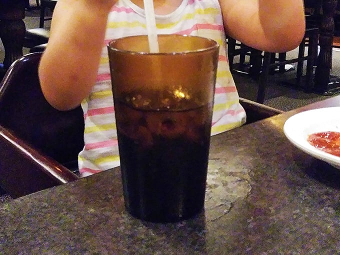 That amber-colored soda in a classic tumbler isn't just a drink&mdash;it's the perfect supporting actor in your steakhouse experience.