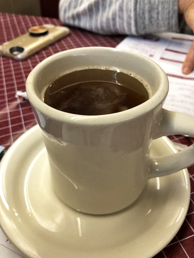Coffee served in a mug substantial enough to warm both hands on a chilly Ohio morning. No fancy latte art needed when the coffee itself is the masterpiece.