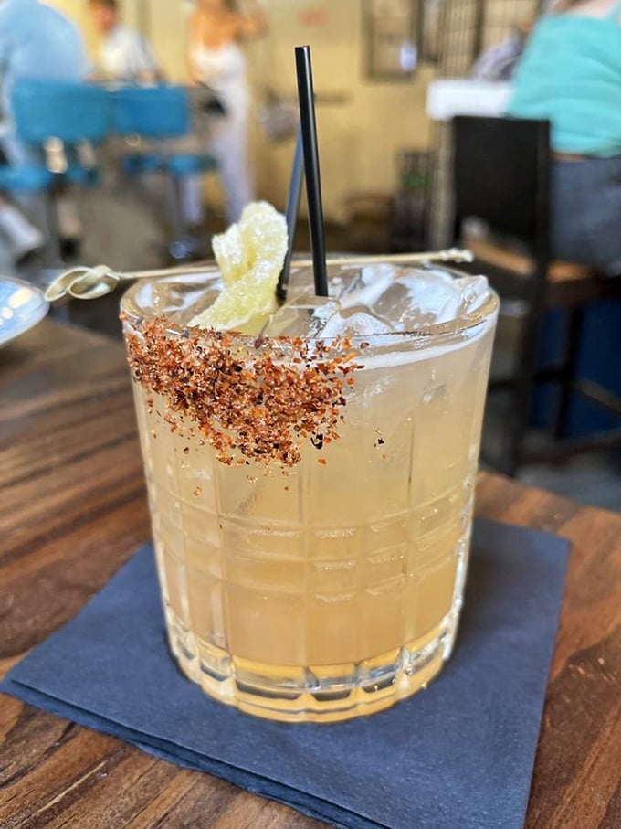 This isn't just a cocktail &ndash; it's a vacation in a glass, with that spiced rim promising a flavor adventure worth the journey.