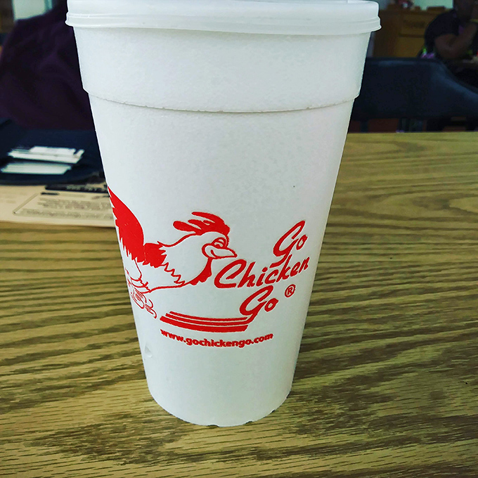 Even the cup is excited about what you're about to experience. That running chicken logo knows exactly why you came.