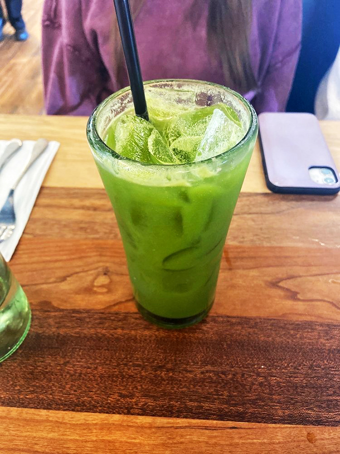 A vibrant green refresher that looks like it contains at least two servings of vegetables. The perfect alibi for ordering that extra side of bacon.