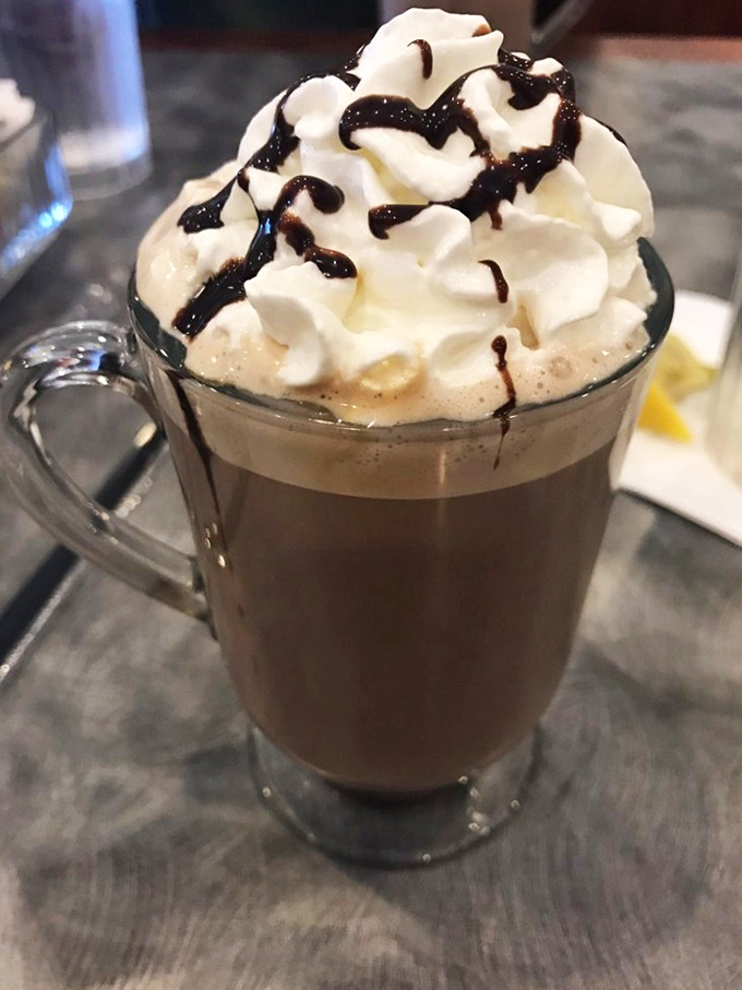Hot chocolate's sophisticated cousin arrives with a cloud of whipped cream and chocolate drizzle that makes coffee feel like a missed opportunity.