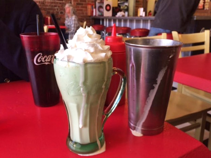 Milkshakes thick enough to require serious straw commitment. That whipped cream mountain isn't just a topping&mdash;it's the cherry on top of your day.