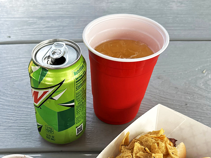 The holy trinity of casual dining: chips, soda, and the promise of a meal that requires no pretense&mdash;just pure, uncomplicated enjoyment.
